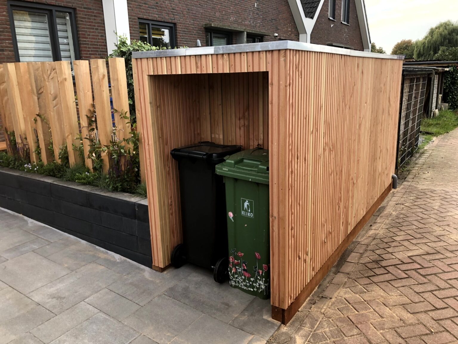 Compacte berging voor fiets en containers - MP Timmer- en Onderhoudsbedrijf